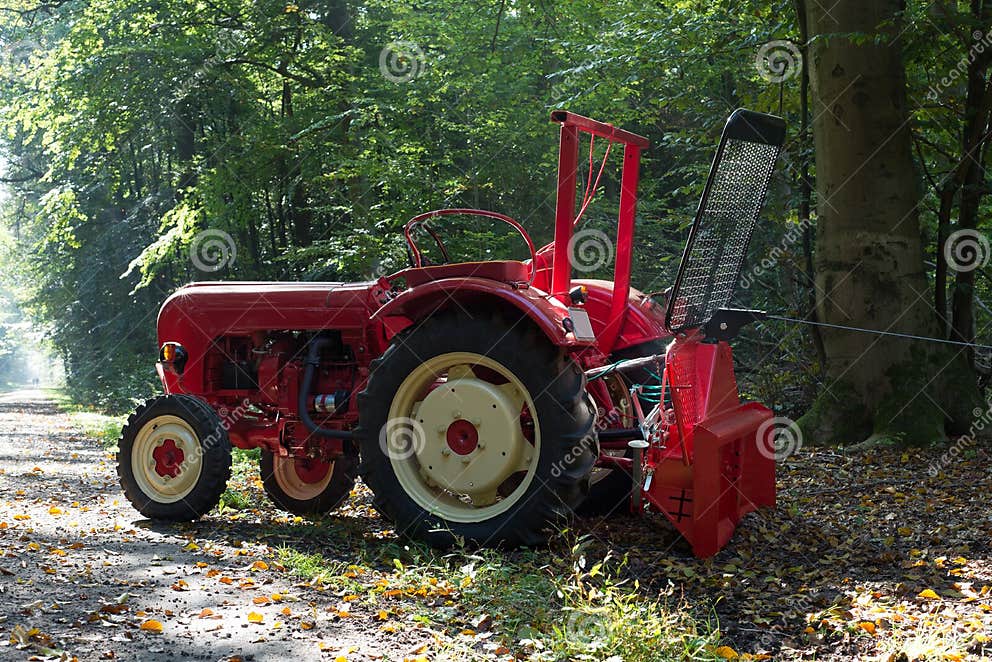 Tractor with Cable Winch during Work in Forest Stock Photo - Image of ...