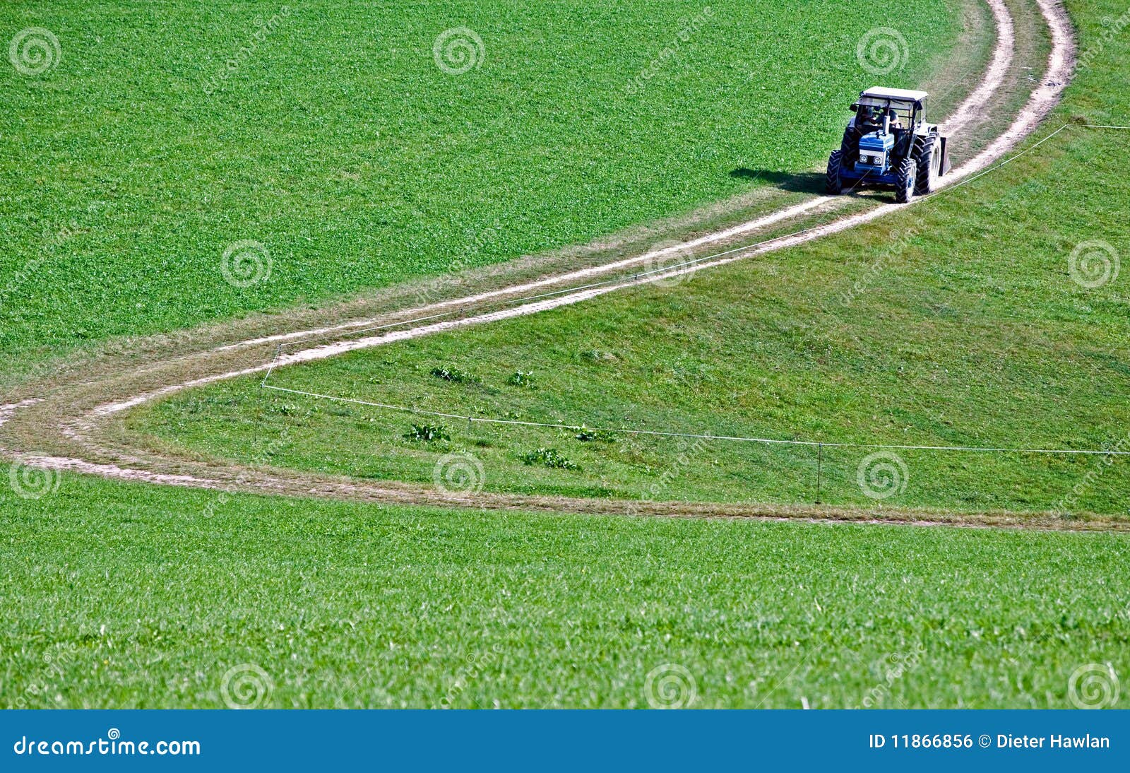 Tractor on a Crooked Road stock photo. Image of nature - 11866856