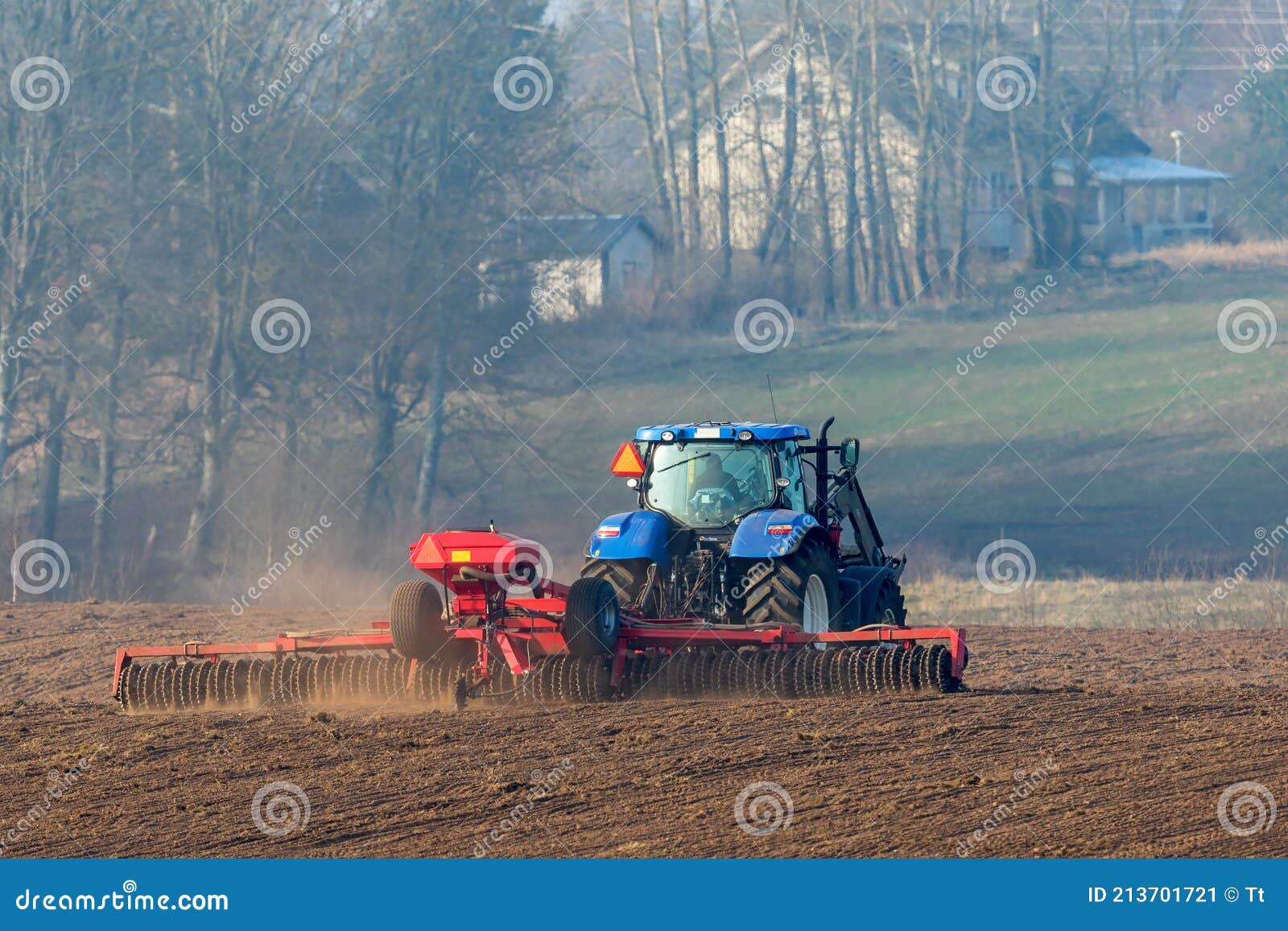 Tractor with a Cultipacker Rollers on the Field at Spring Stock Image ...
