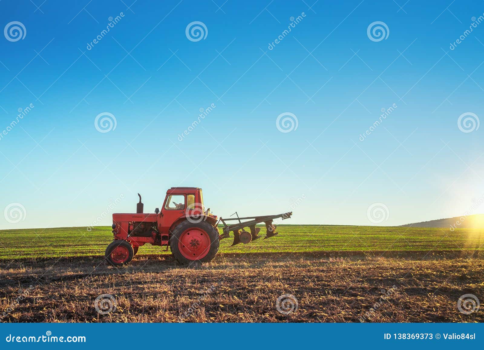 Tractor Cultivating Field at Spring Stock Image - Image of plough ...