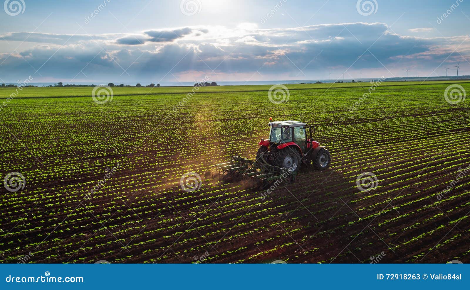 Tractor Cultivating Field At Spring,Tillage Is The Agricultural ...