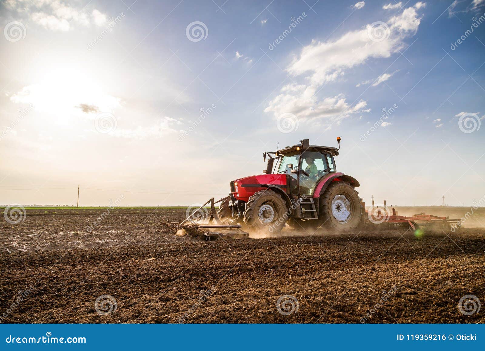 Tractor Cultivating Field at Spring Stock Photo - Image of cultivator ...