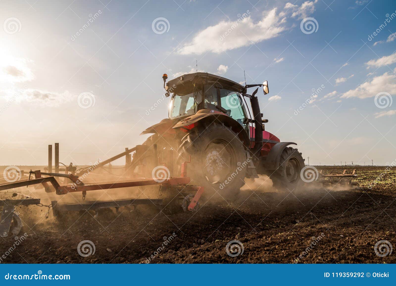 Tractor Cultivating Field at Spring Stock Photo - Image of soil ...