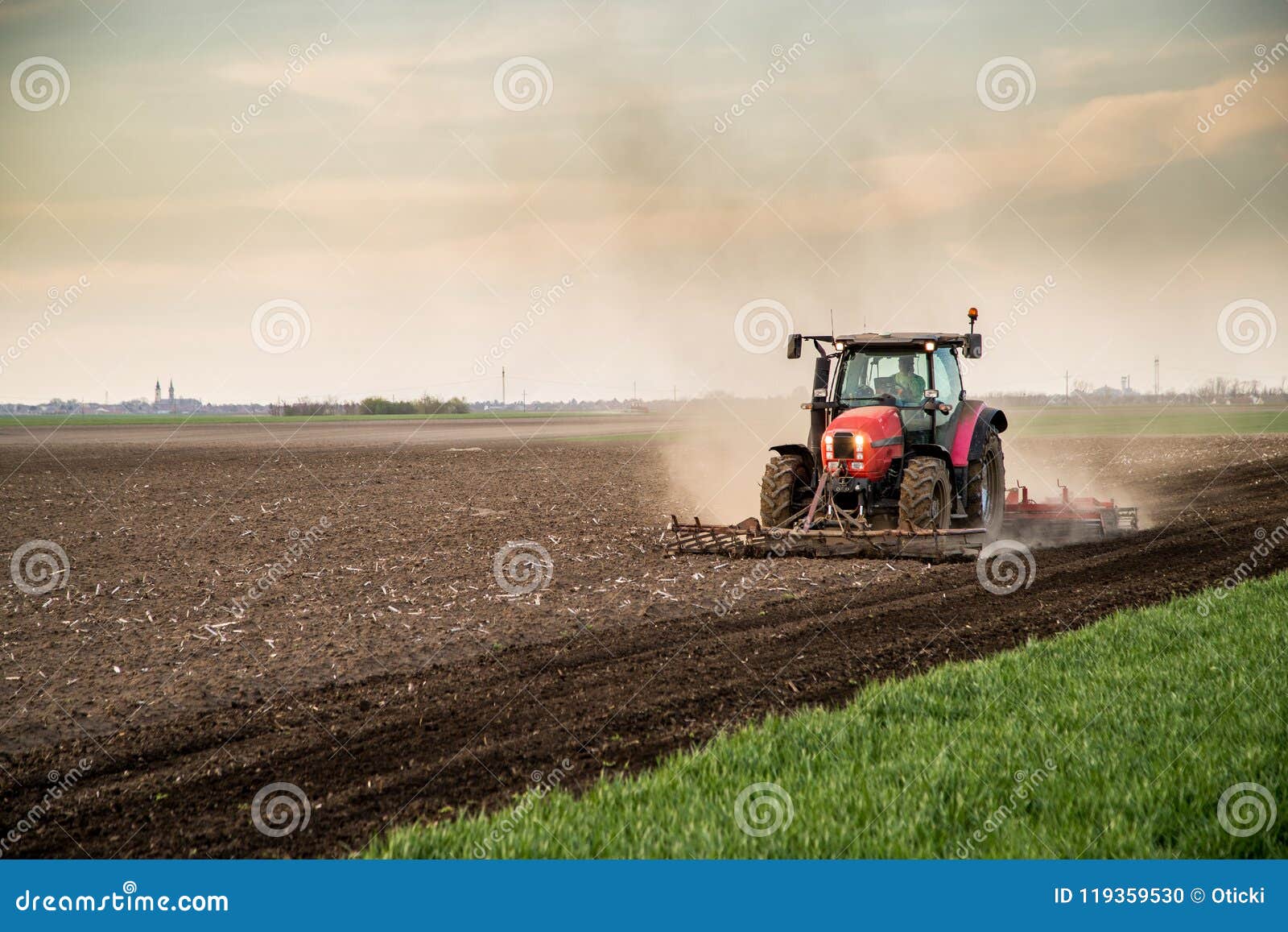 Tractor Cultivating Field at Spring Stock Photo - Image of rural ...