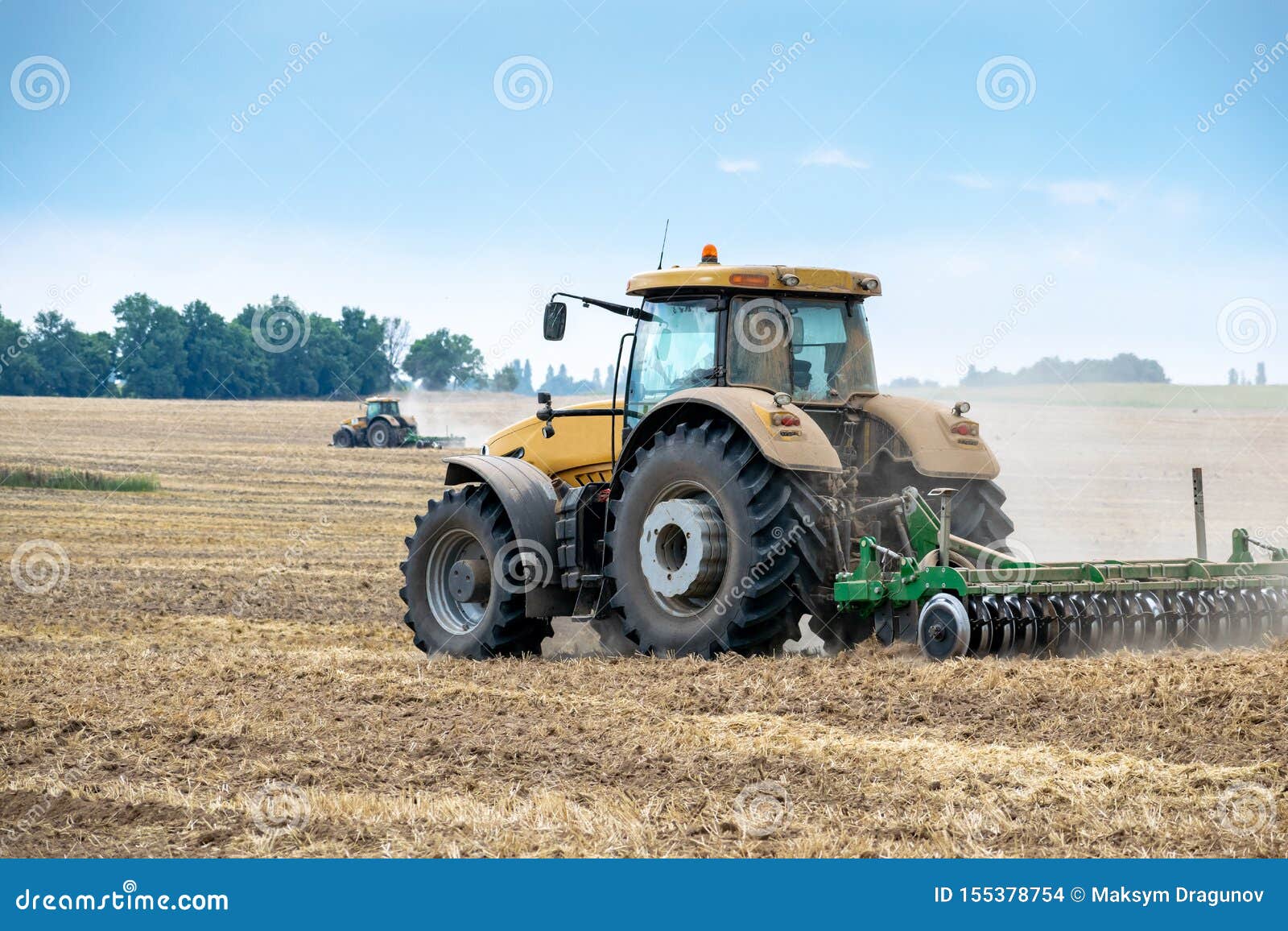 Tractor Cultivating the Field Stock Photo - Image of land, cultivated ...