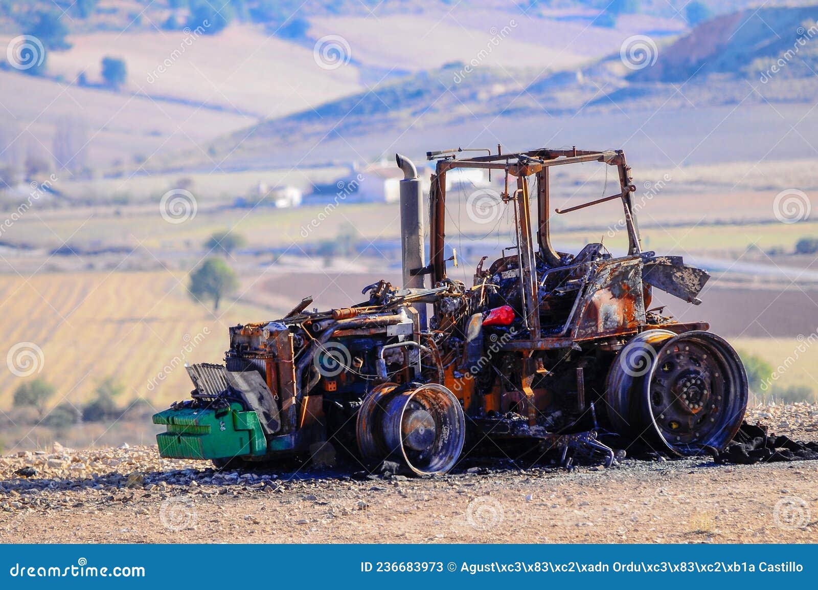 Tractor Destroyed by Fire in the Middle of the Field. Stock Image ...