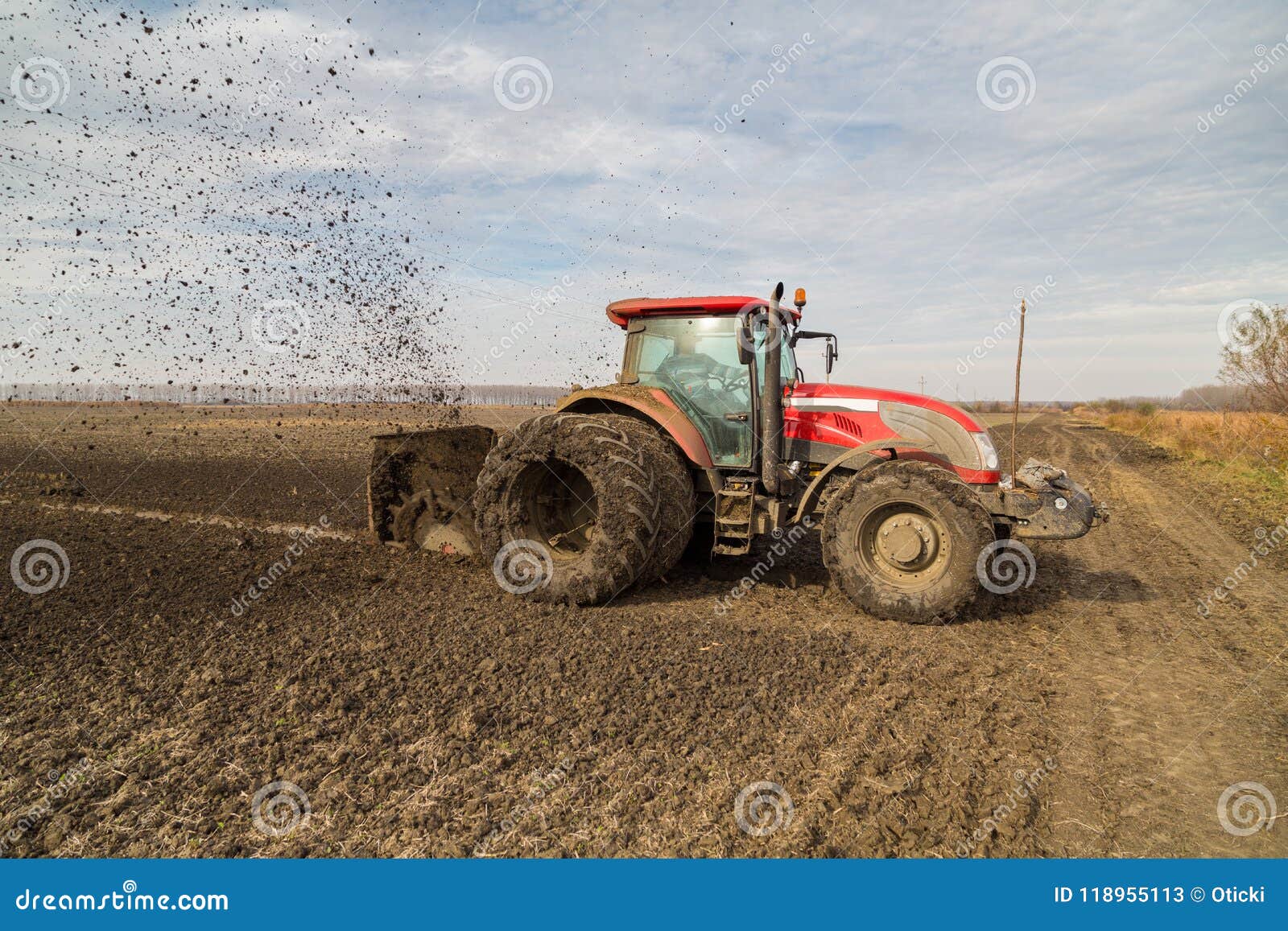 Tractor With Double Wheeled Ditcher Digging Drainage Canal Stock Image ...