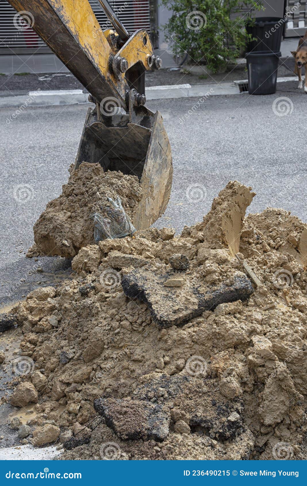 Tractor Dug Up Earth from the Asphalt Street. Stock Image - Image of ...