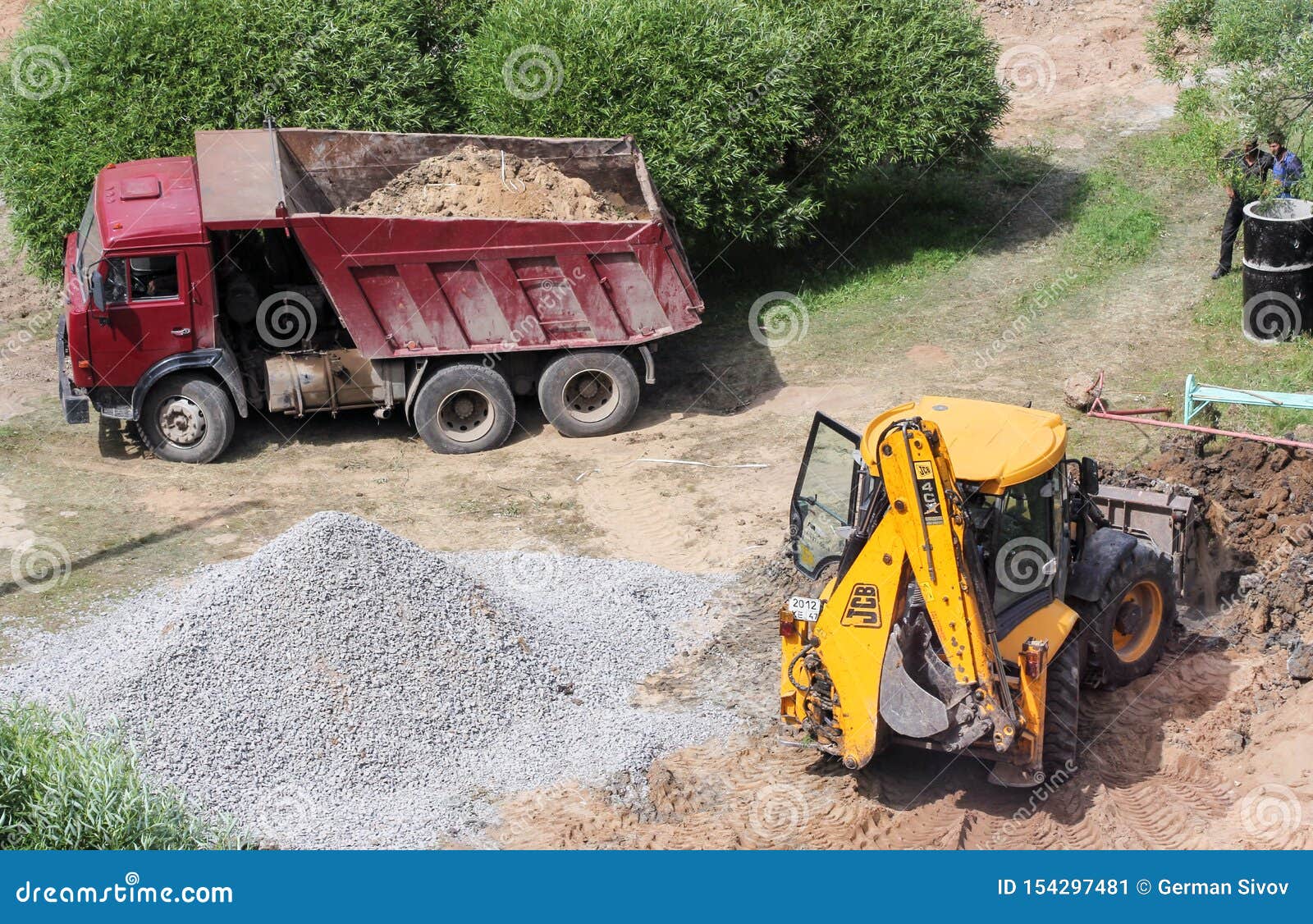 Tractor with Dump Truck on Loading Editorial Photo - Image of site ...