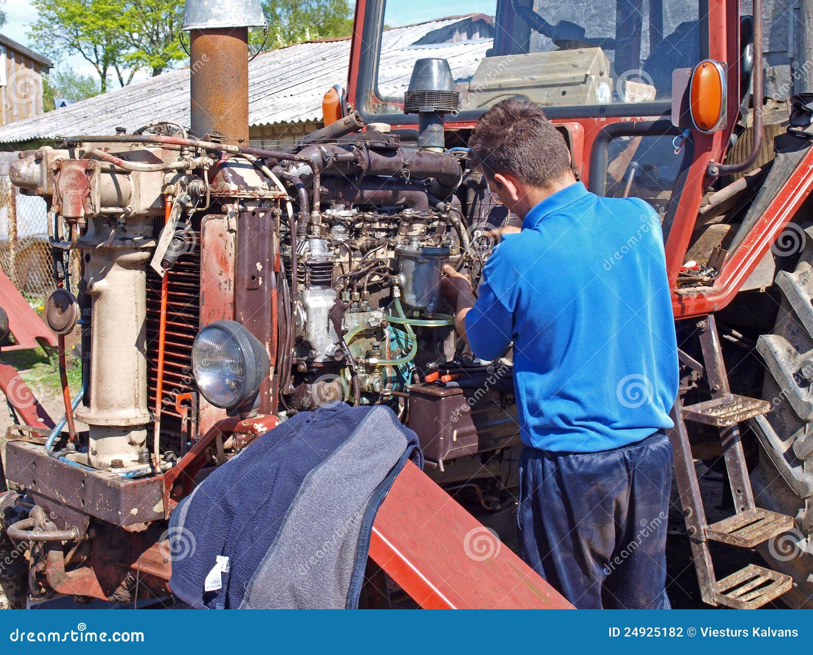 Tractor engine repairing stock photo. Image of sunny - 24925182