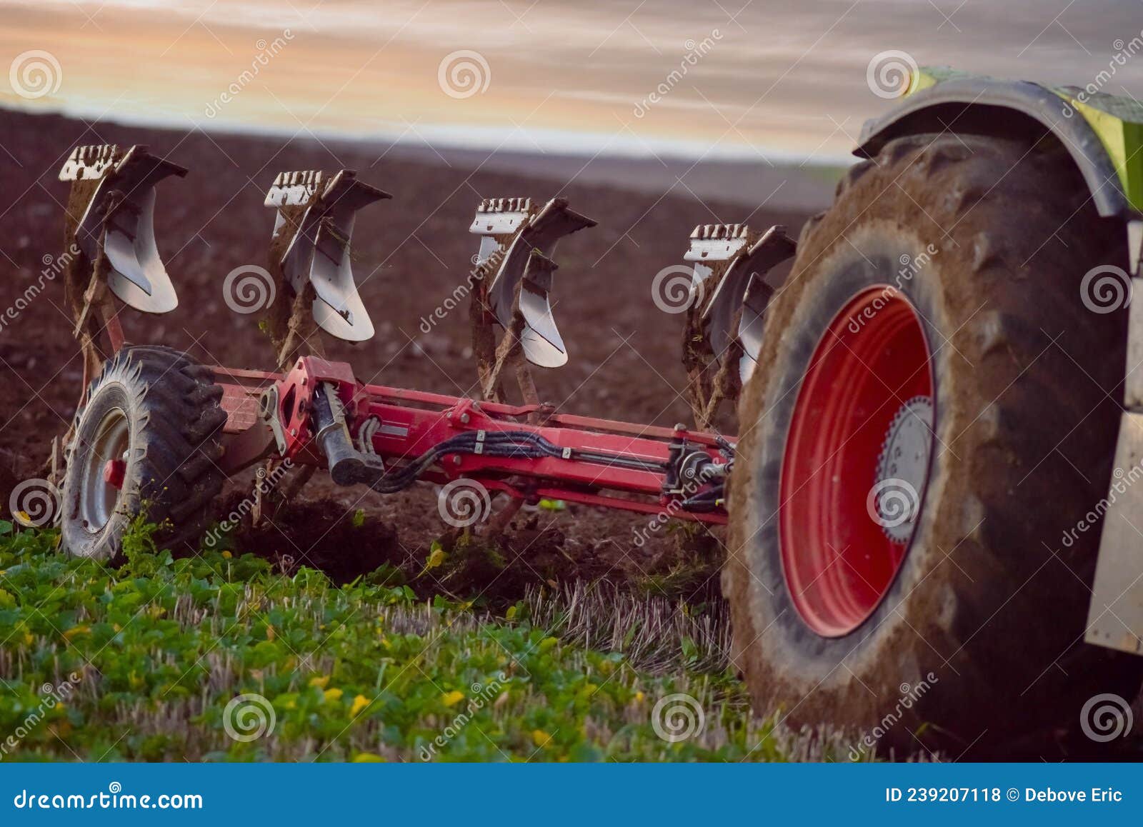 Tractor Equipped with a Plow in Action in a Field Close-up Stock Photo ...