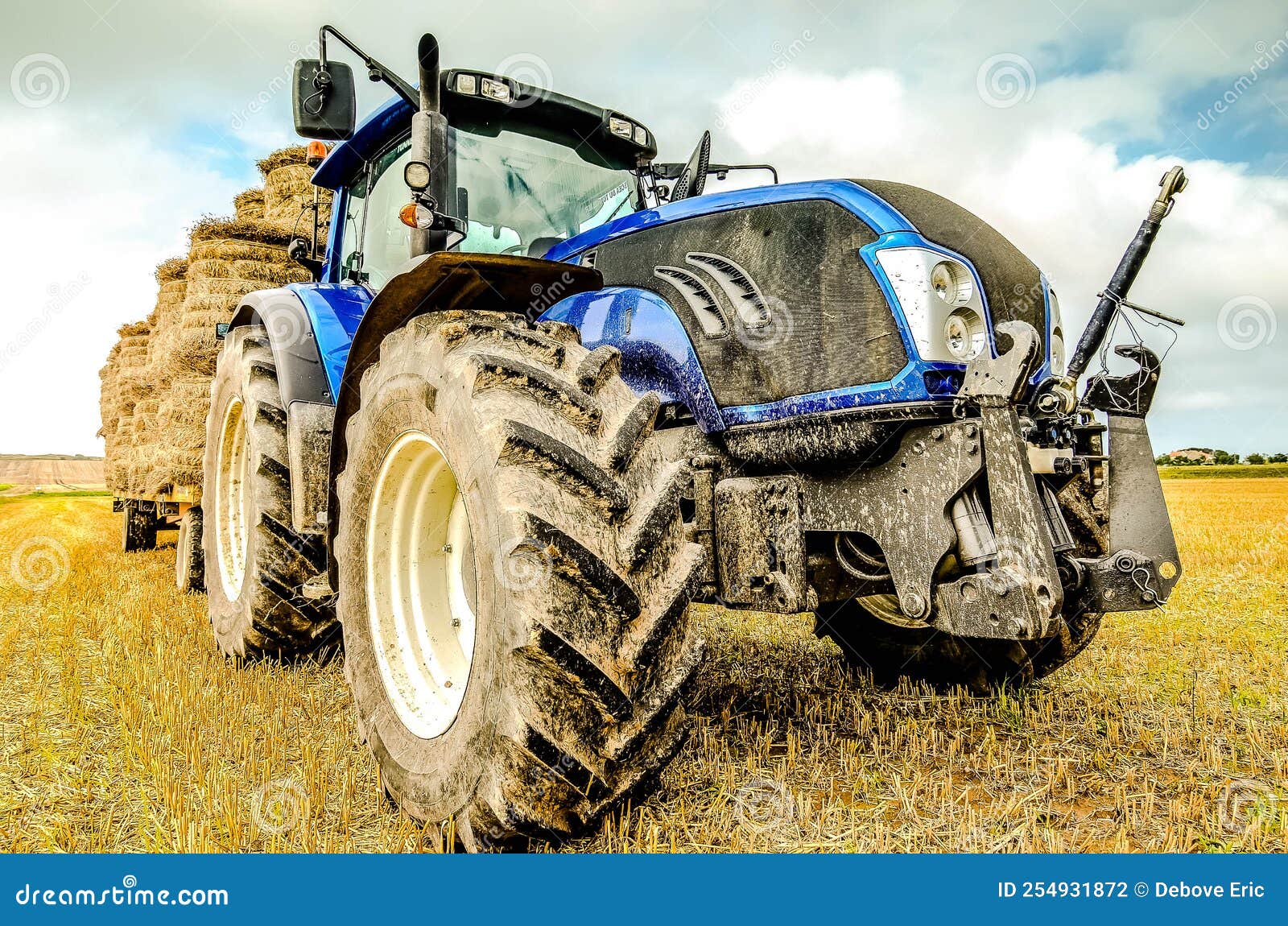 Tractor Equipped with a Trailer for Stacks of Flax Close-up Stock Photo ...