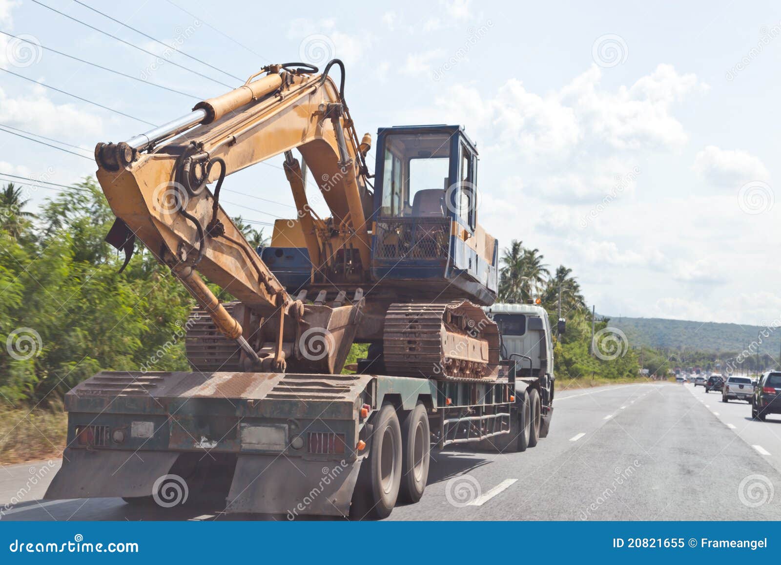 Tractor Excavator on truck stock image. Image of demolition - 20821655