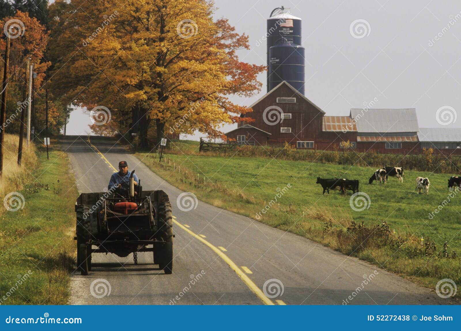 Tractor on Farm Road with Barn and Silo in Background in Autumn, VT ...