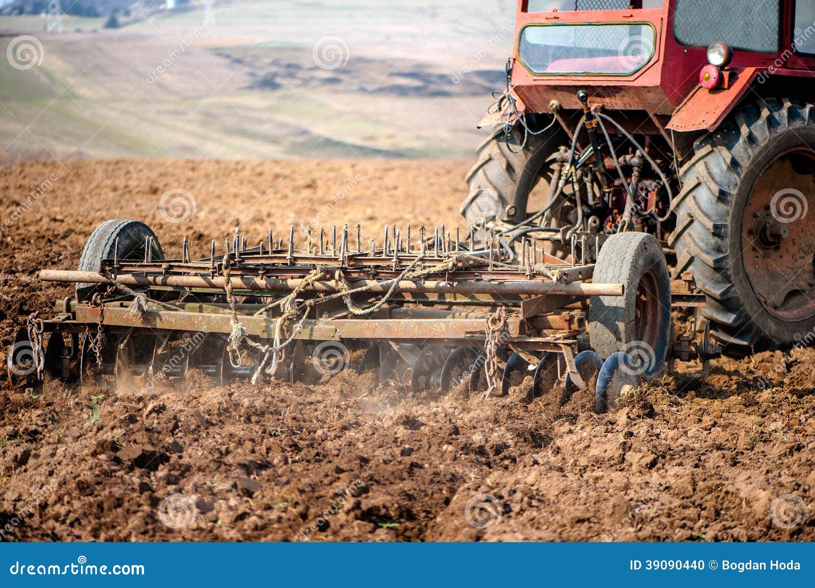 Tractor at Farm Working the Field Stock Photo - Image of landscape ...