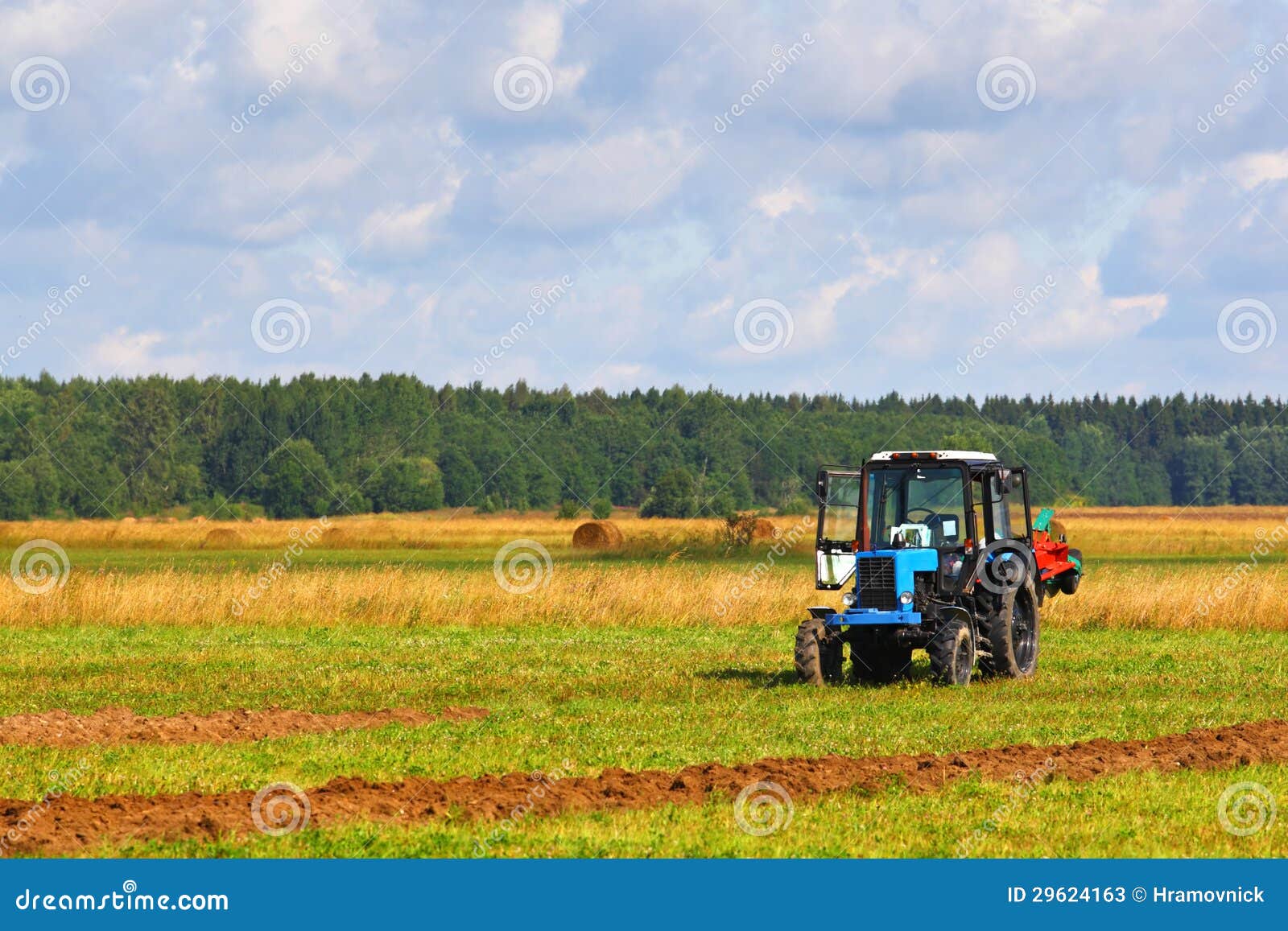 Tractor on a farmer field stock image. Image of field - 29624163