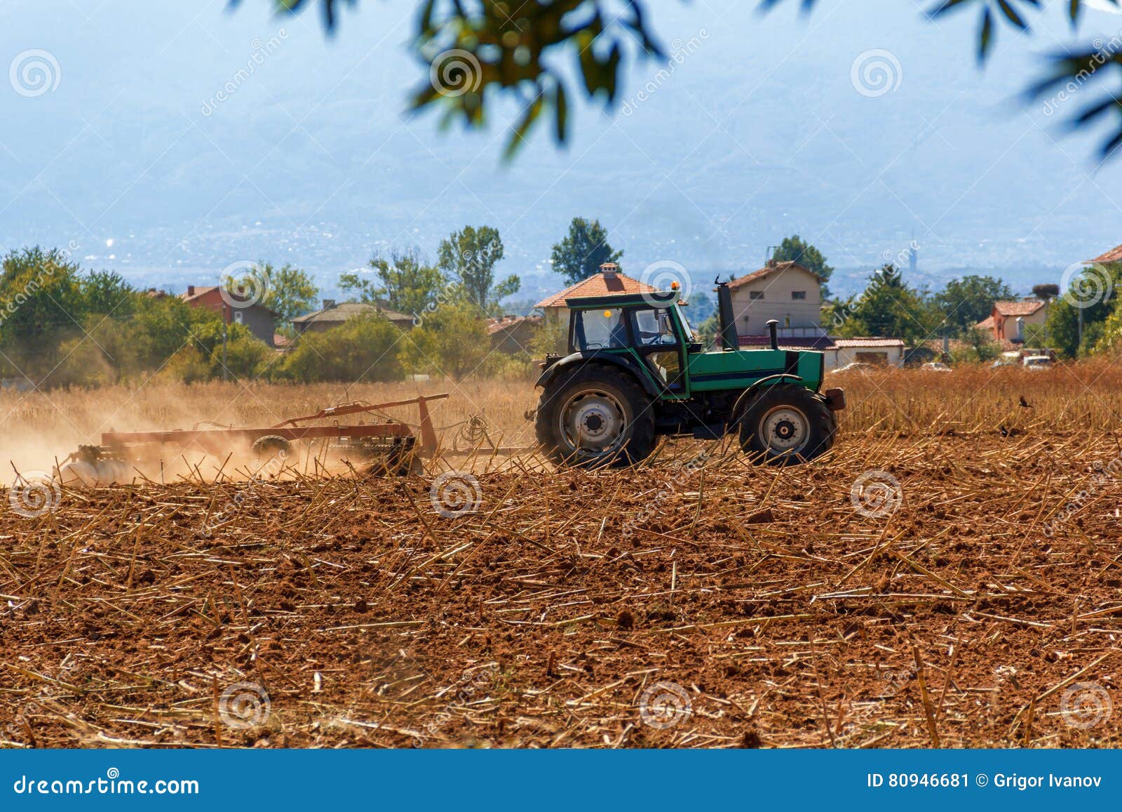 Tractor in a farmer field stock image. Image of equipment - 80946681