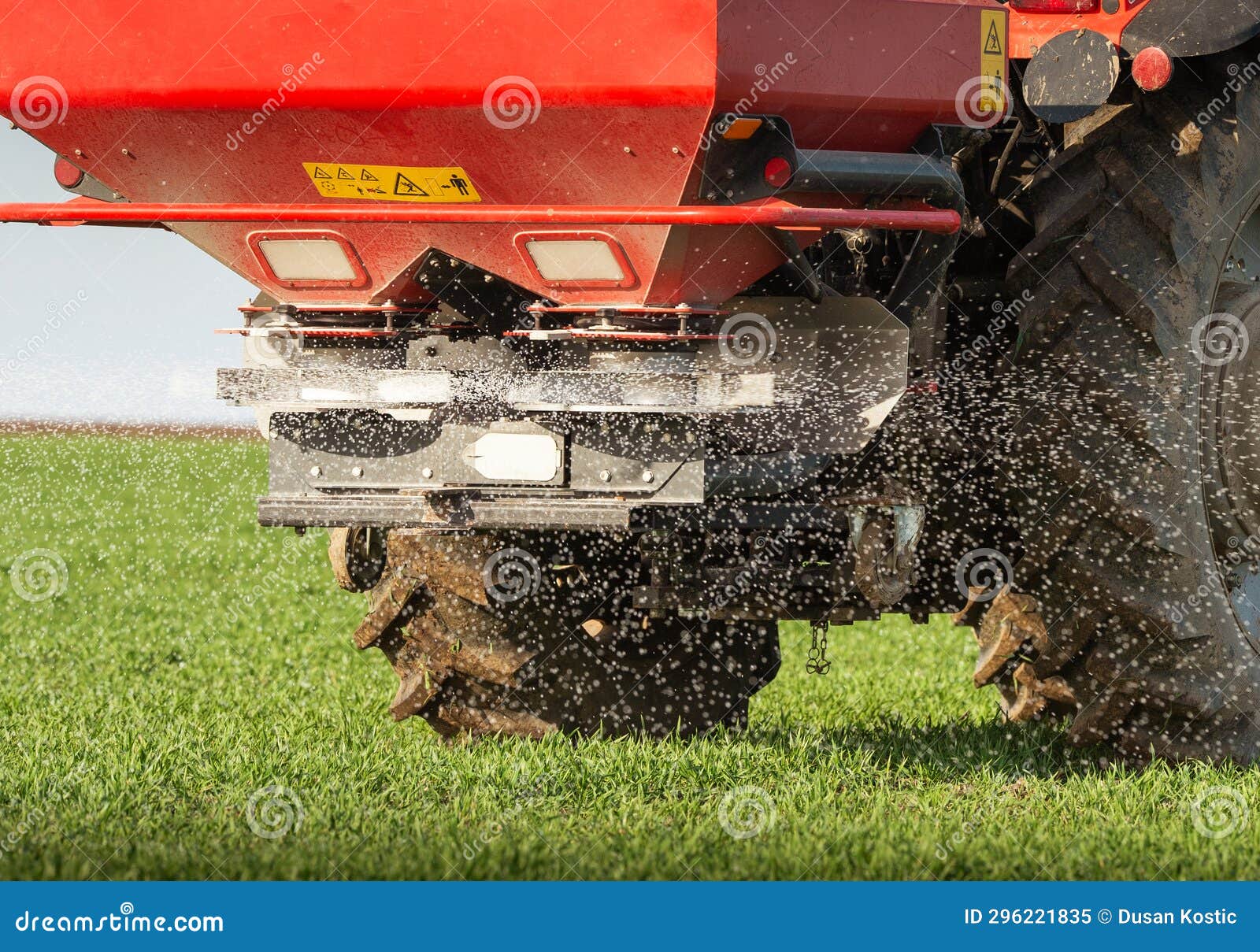 Tractor Fertilizing in Field Stock Image - Image of tractor, driving ...