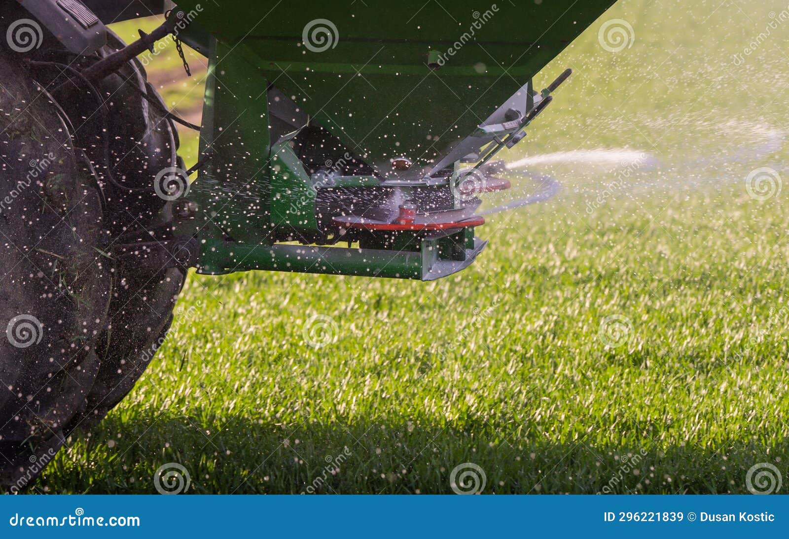 Tractor Fertilizing in Field Stock Image - Image of grass, agriculture ...