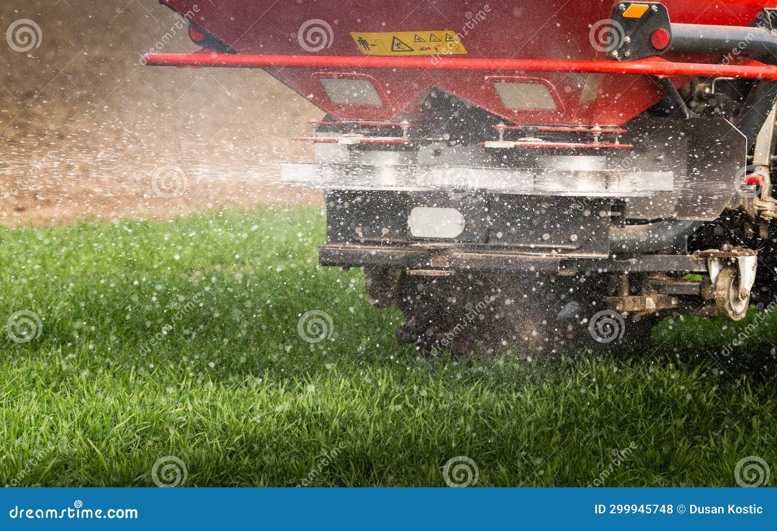 Tractor Fertilizing in Field Stock Photo - Image of space, farmland ...