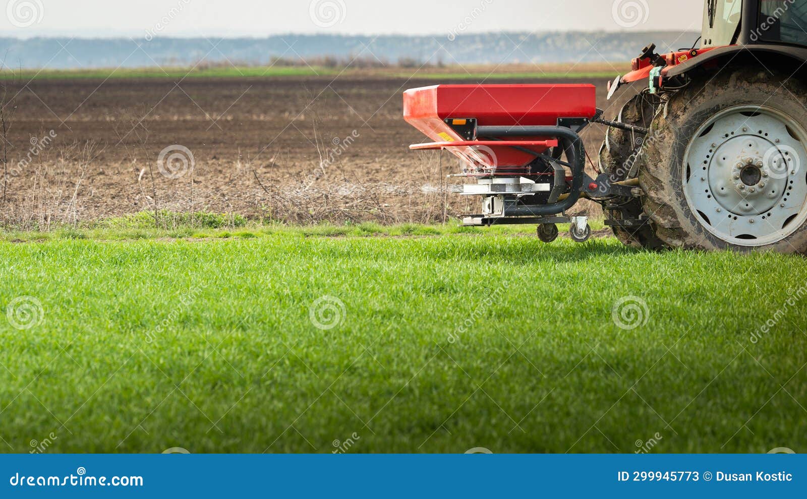 Tractor Fertilizing in Field Stock Image - Image of scene, agriculture ...