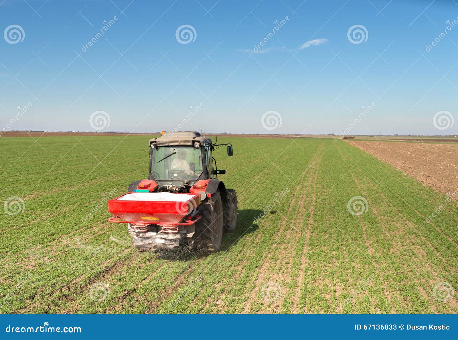 Tractor Fertilizing in Field Stock Image - Image of preparation ...
