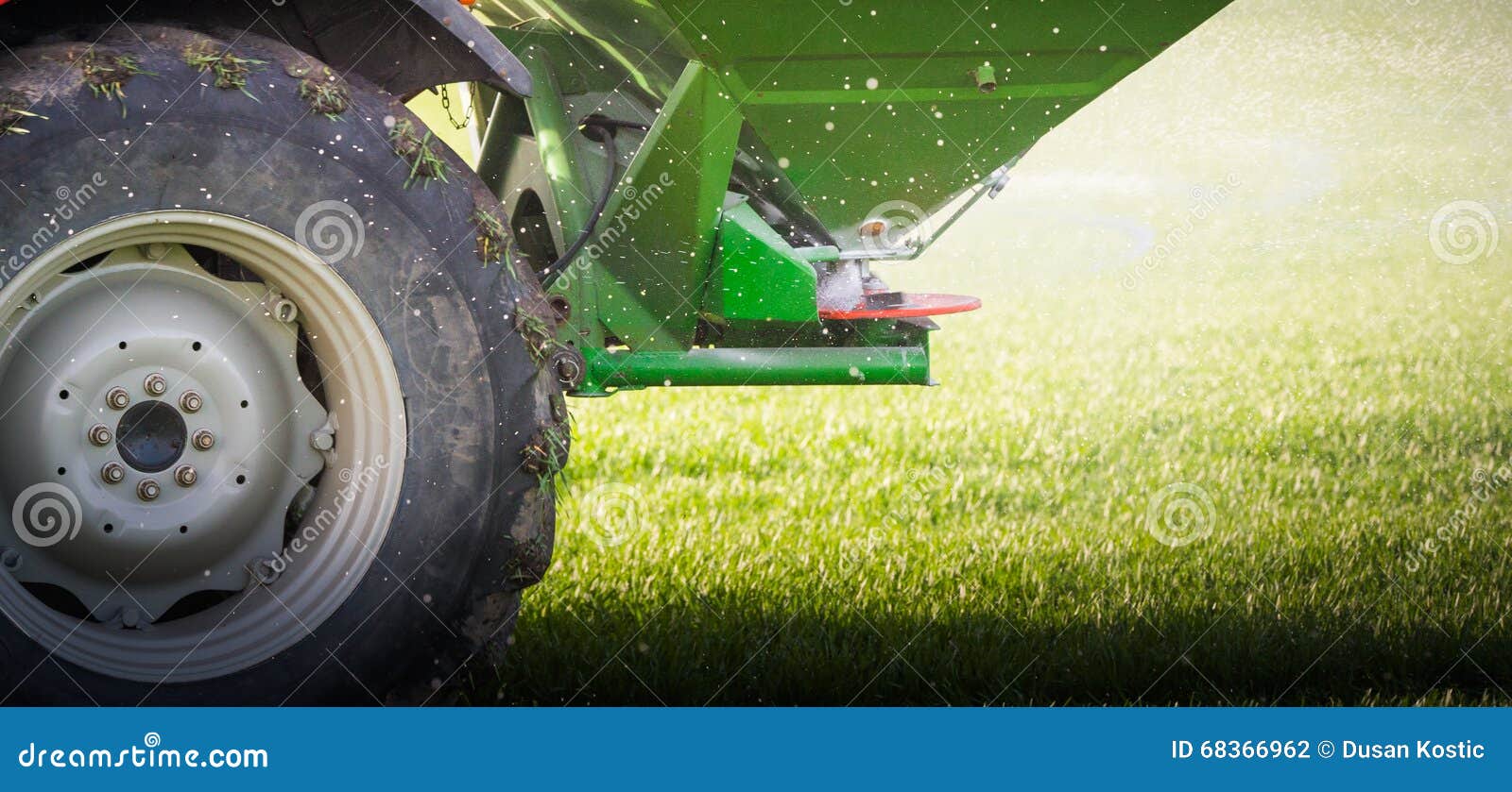 Tractor Fertilizing in Field Stock Photo - Image of countryside ...
