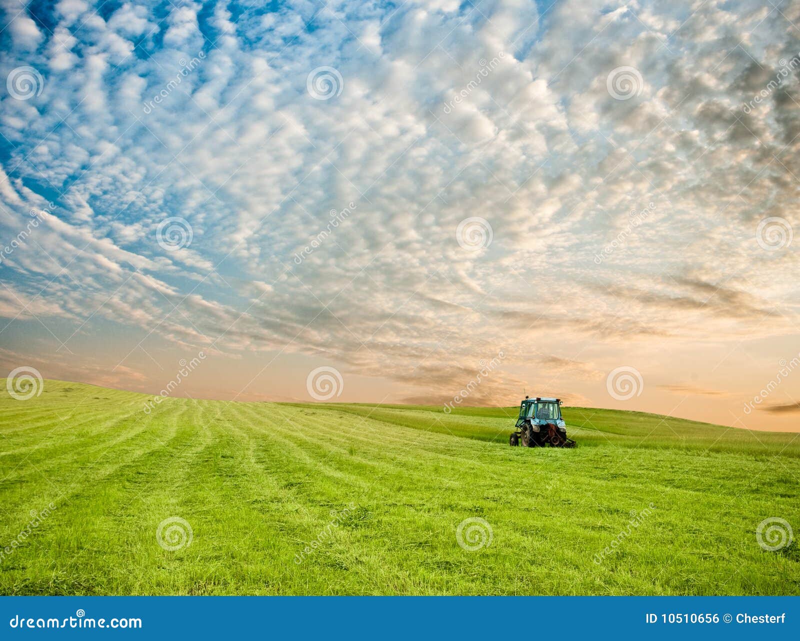 Tractor On A Field With Rainbow In The Background Royalty-Free Stock ...
