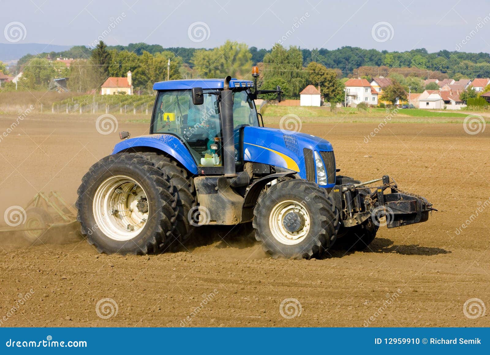 Tractor on field stock photo. Image of machineries, farm - 12959910