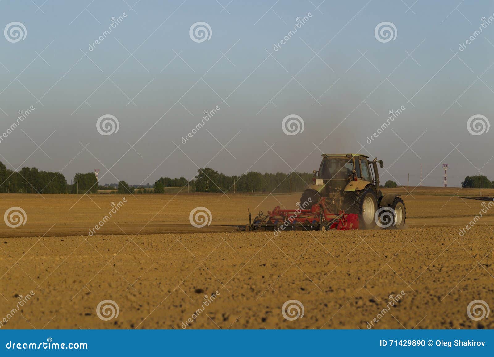 The Tractor in the Field on Agricultural Operations Stock Photo - Image ...