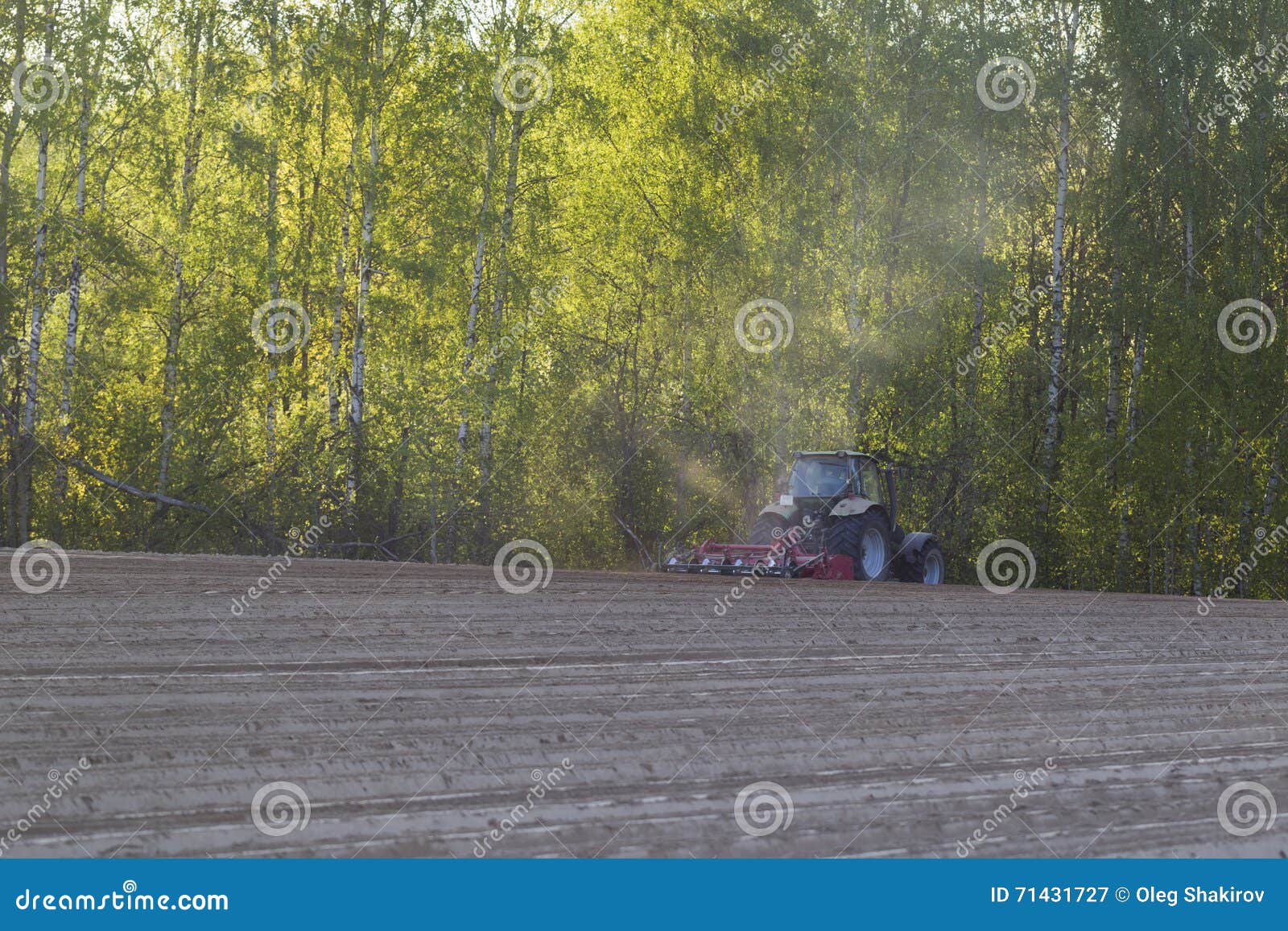 The Tractor in the Field on Agricultural Operations Stock Image - Image ...