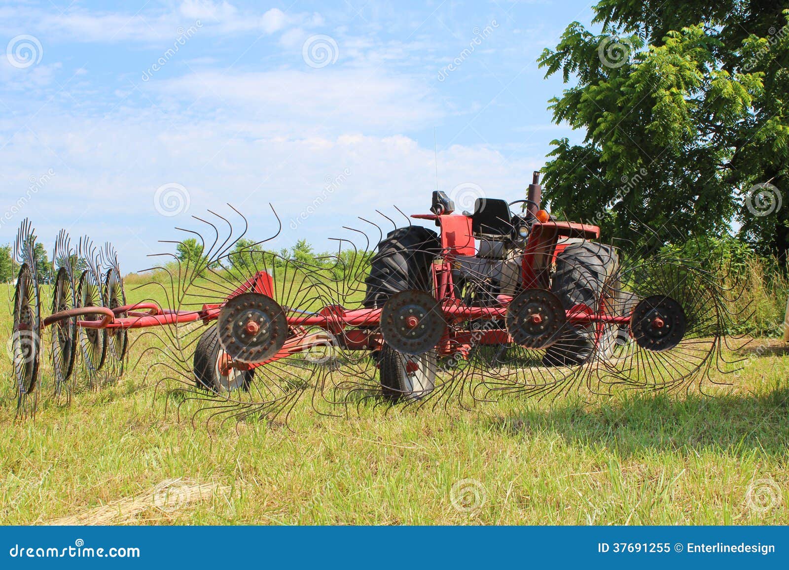 Tractor in Field with Hay Rake Stock Image - Image of equipment, bale ...