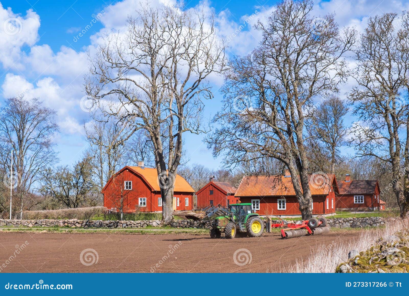 Tractor on a Field in Spring Farming at an Old Farm Editorial Photo ...