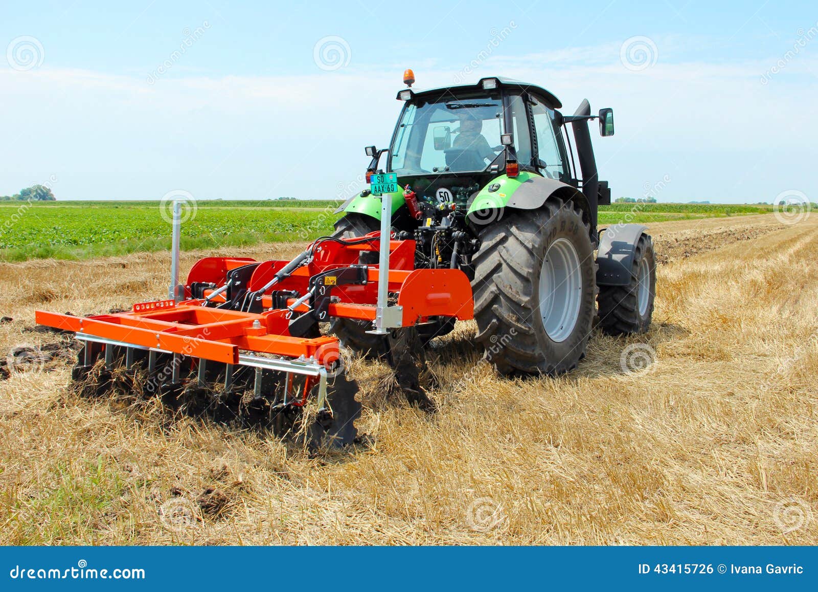 Tractor on the field stock photo. Image of disc, dozer - 43415726