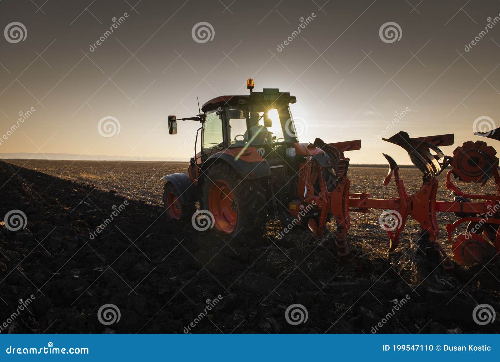 Tractor on the Field during Sunset Stock Photo - Image of nature ...