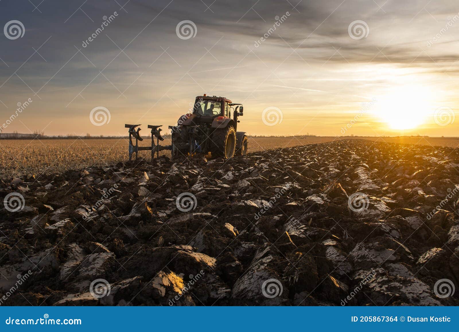 Tractor on the Field during Sunset Stock Photo - Image of plows, black ...