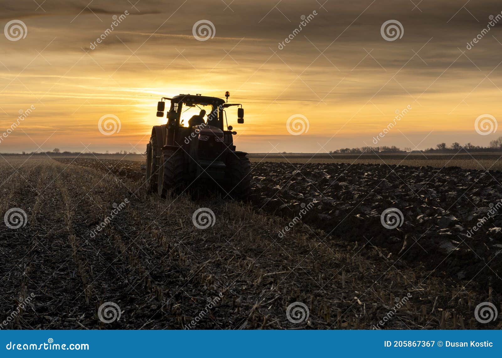 Tractor on the Field during Sunset Stock Image - Image of field, view ...