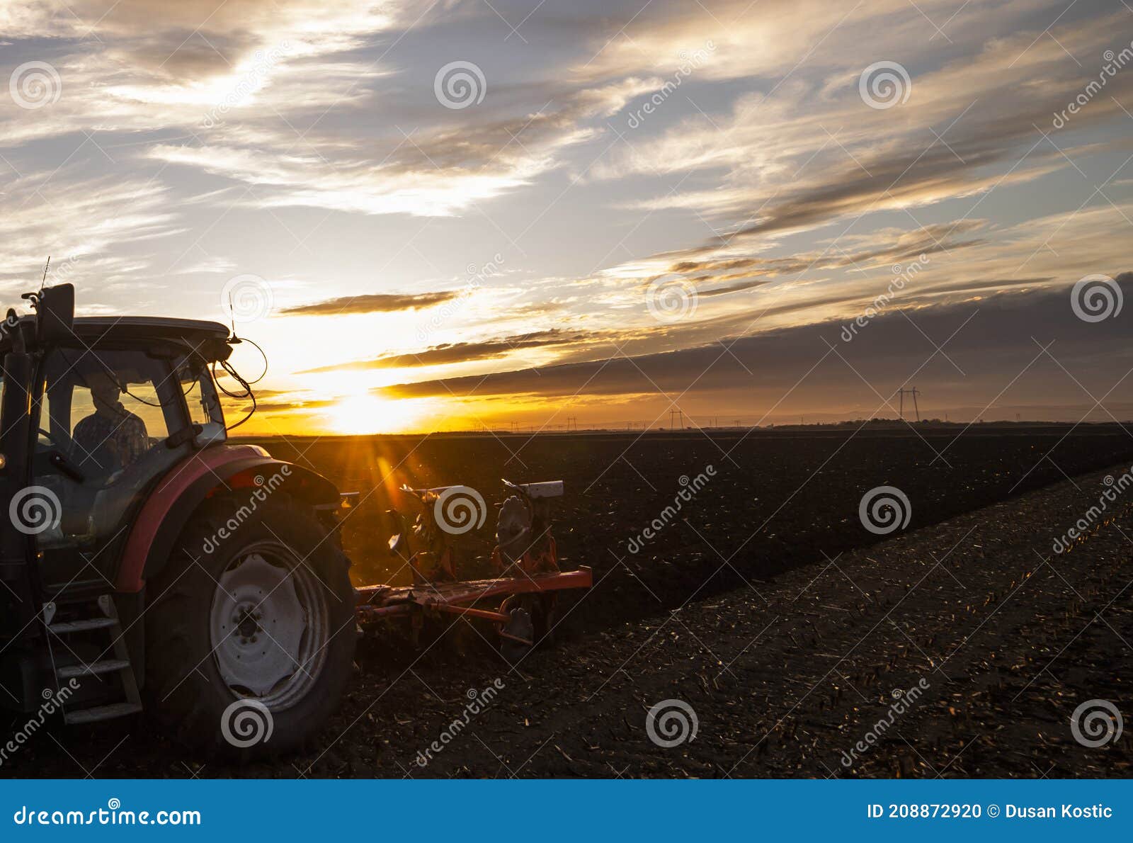 Tractor on the Field during Sunset Stock Photo - Image of land, side ...