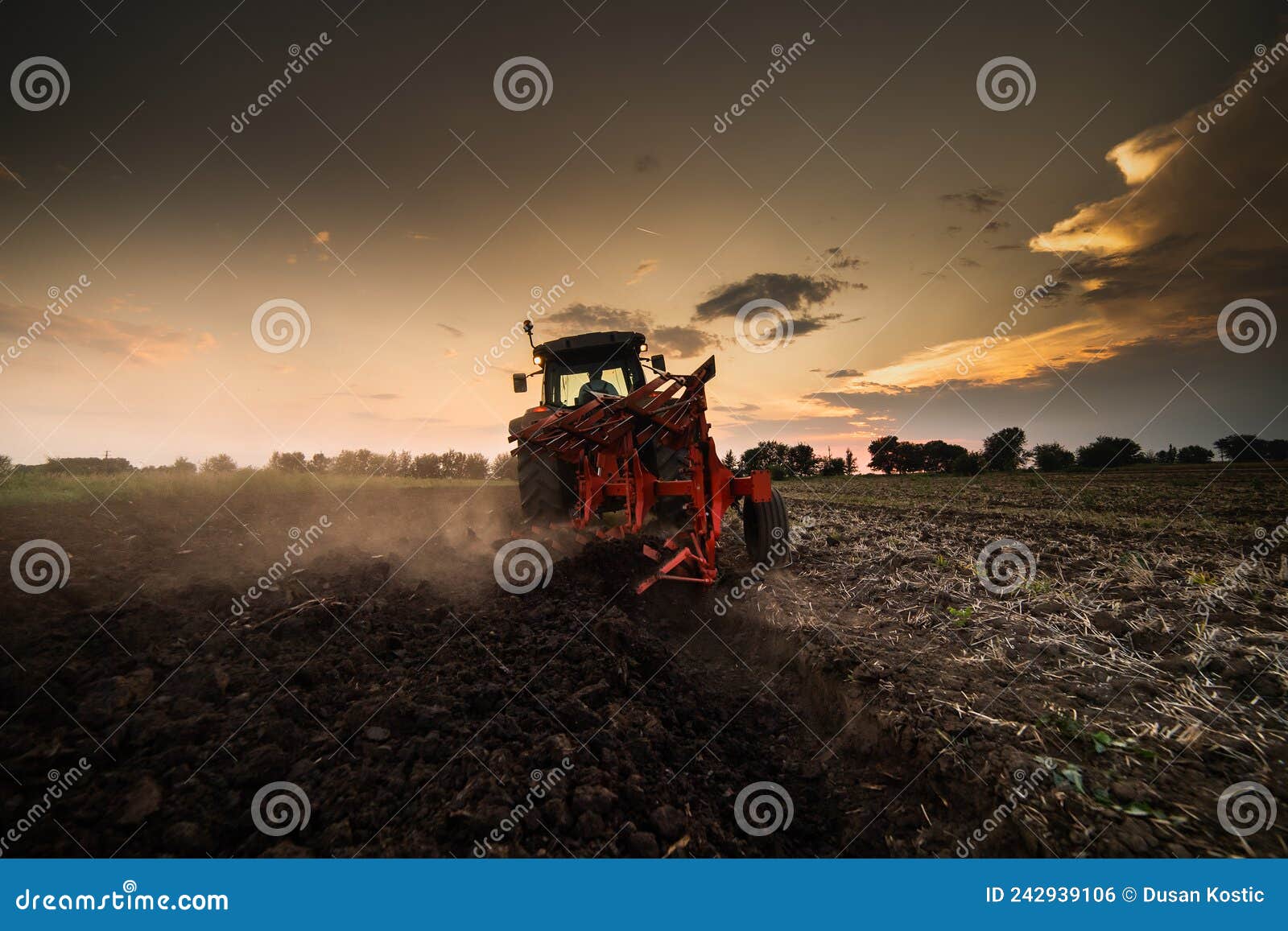 Tractor on the Field during Sunset Stock Photo - Image of land, tractor ...