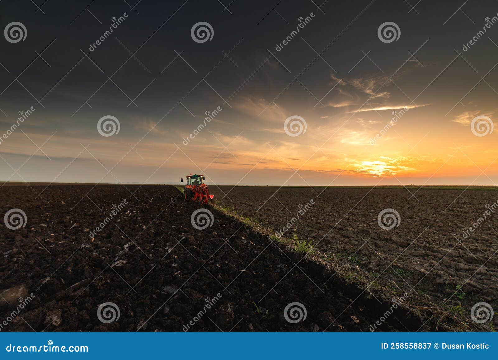 Tractor on the Field during Sunset Stock Image - Image of machinery ...