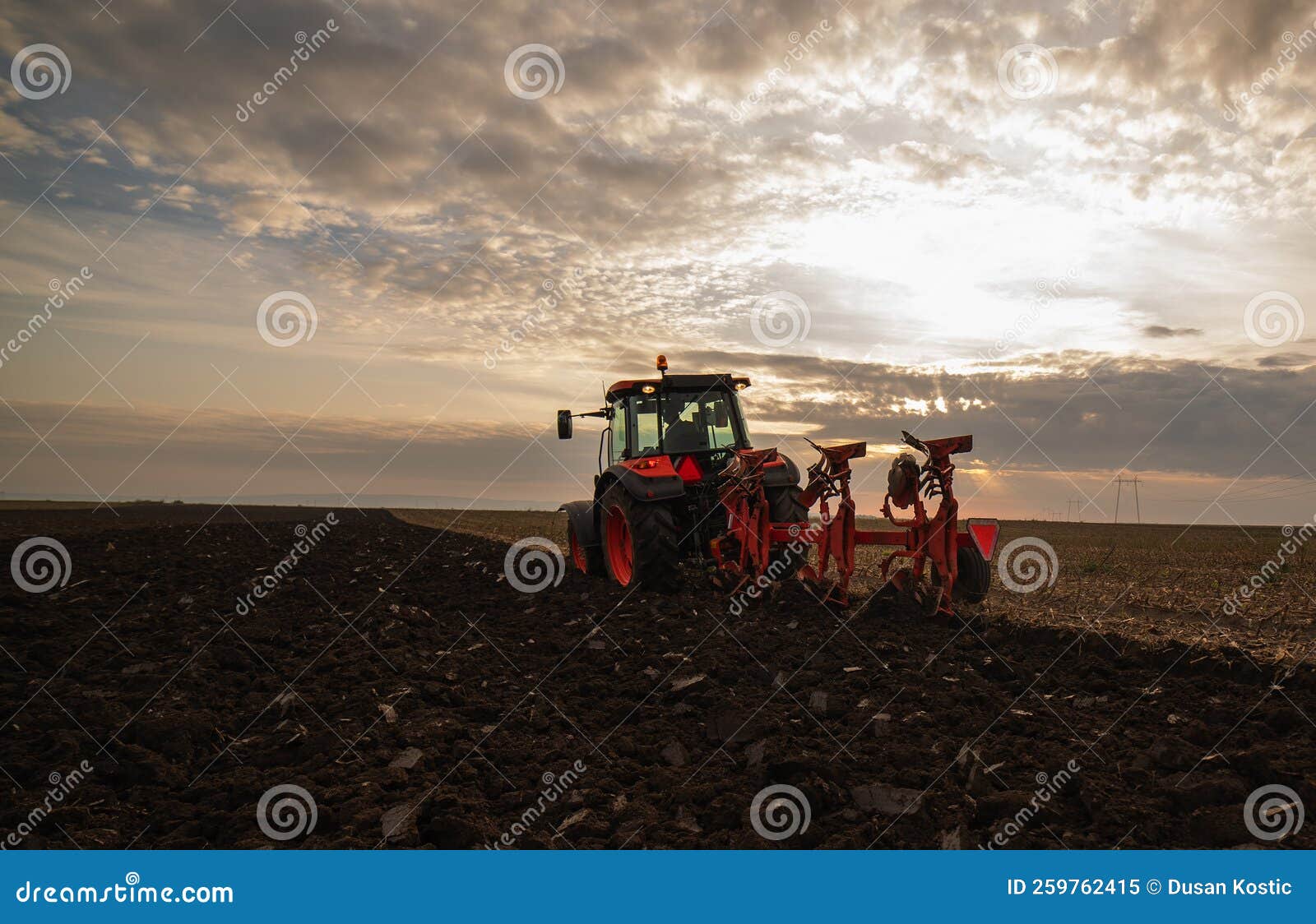Tractor on the Field during Sunset Stock Image - Image of tractor ...