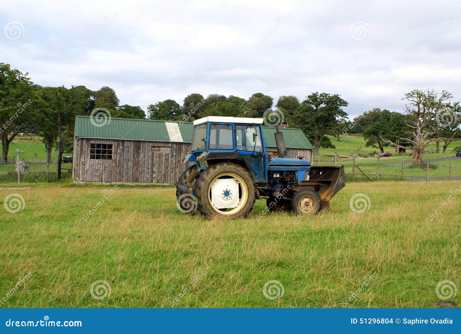 Tractor in a field stock photo. Image of landscape, transport - 51296804