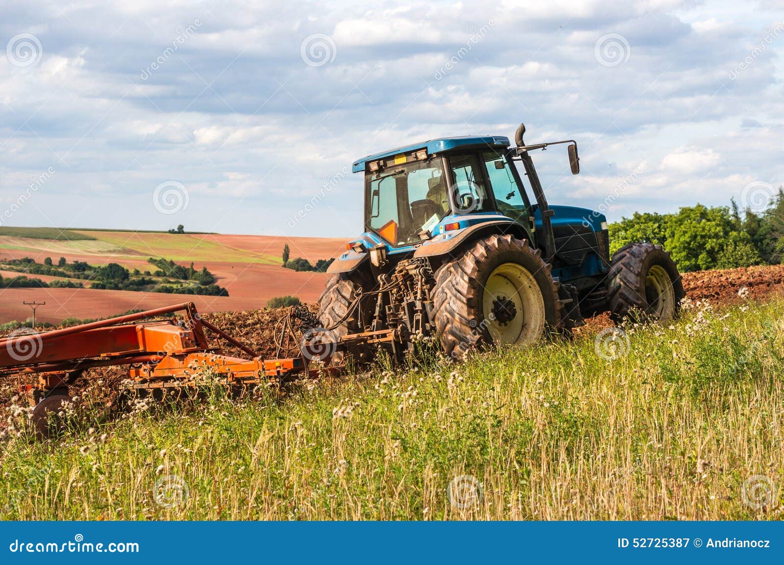 Tractor on the field stock image. Image of farm, harvesting - 52725387