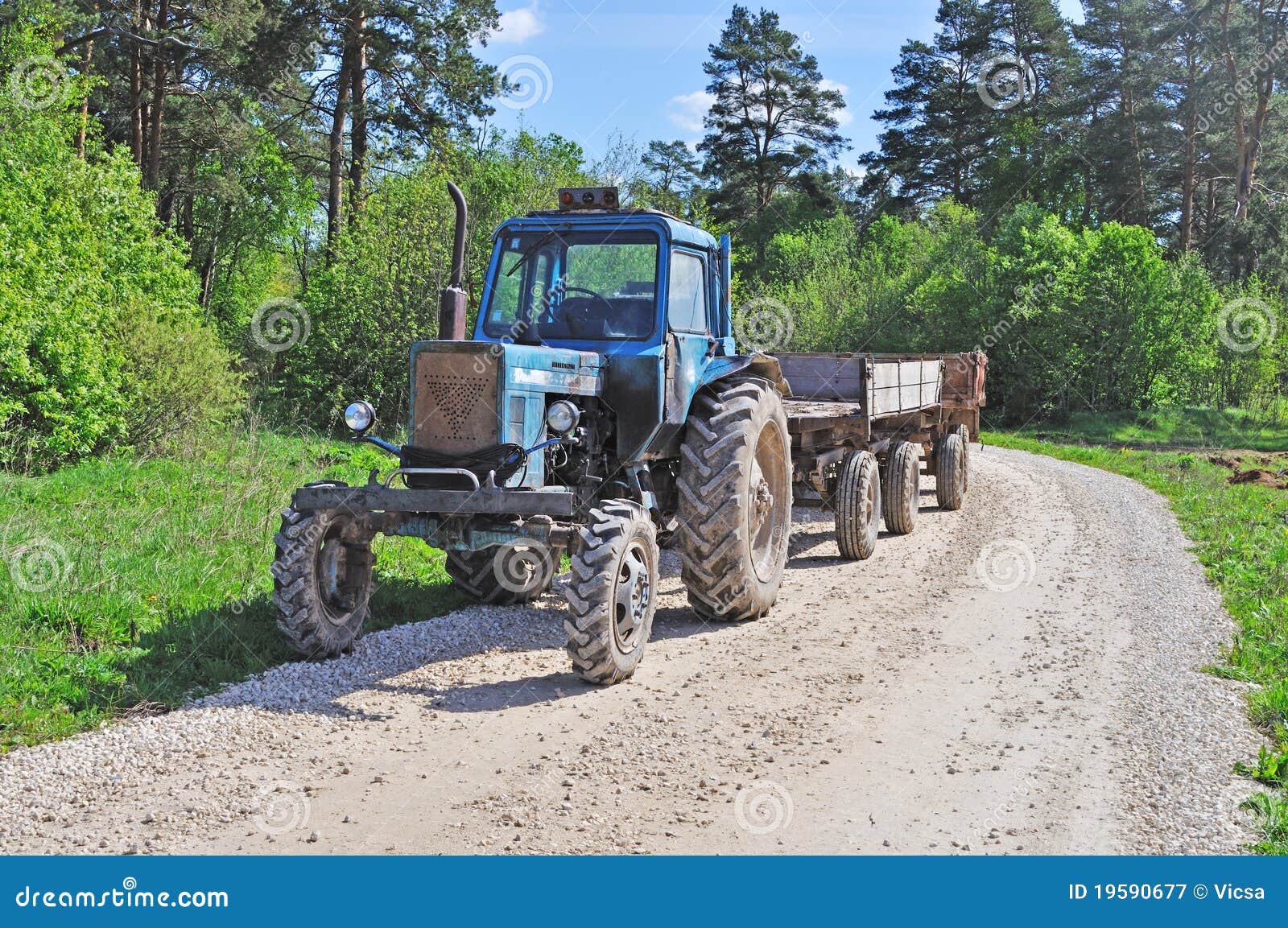 Tractor on forest road stock image. Image of birch, crushed - 19590677