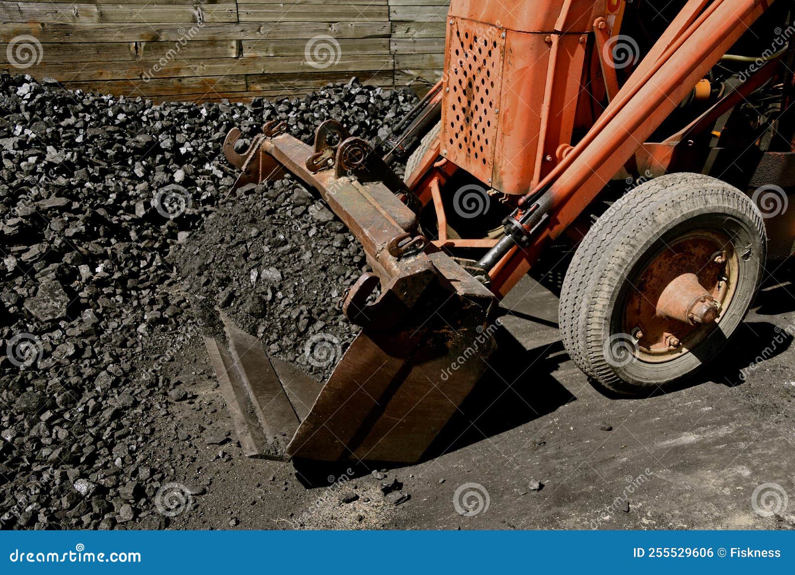 Tractor with a Front End Scoop is Loading Coal Stock Photo - Image of ...