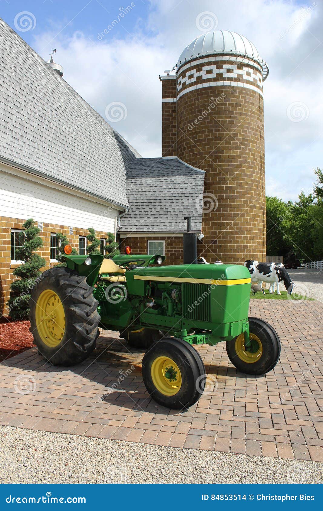 A Tractor in Front of a Silo Editorial Stock Image - Image of grass ...