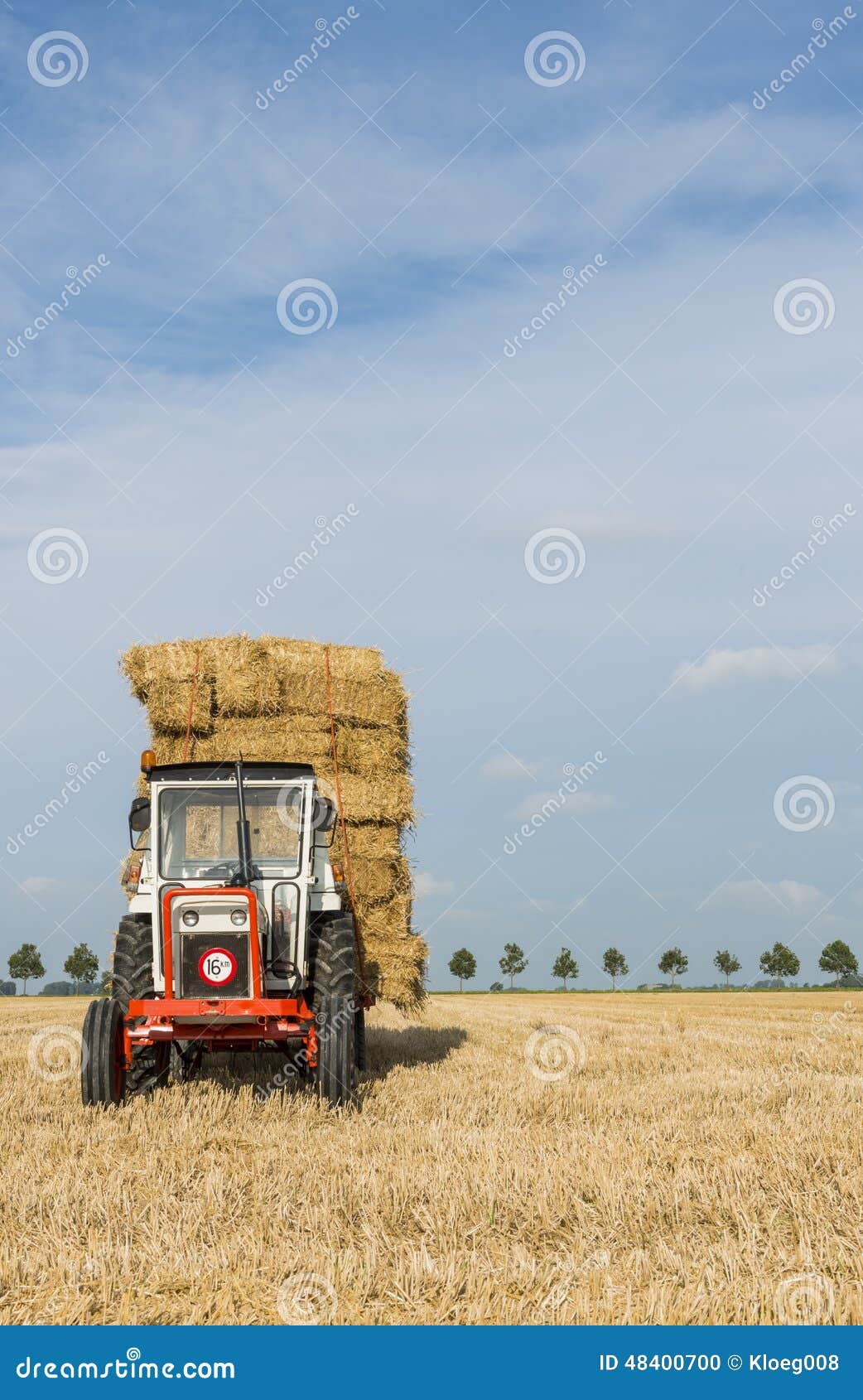 Tractor on Grain Field editorial image. Image of clouds - 48400700