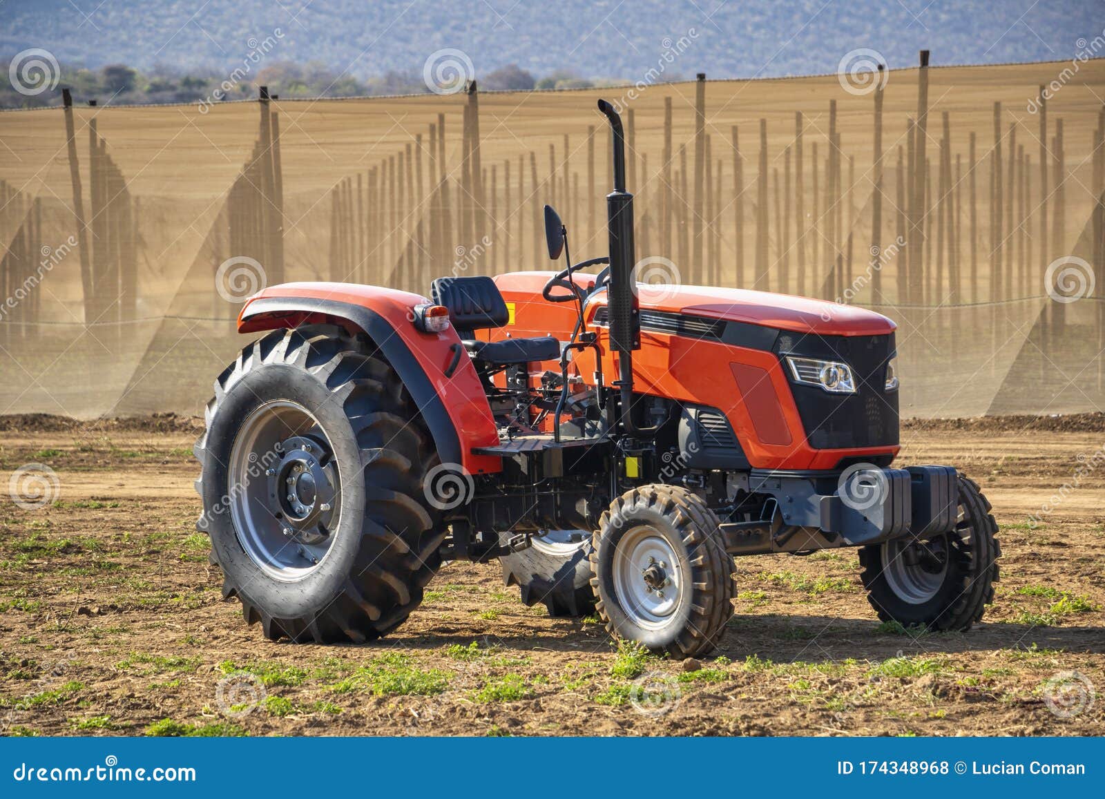 Tractor at the greenhouse stock photo. Image of cultivator - 174348968