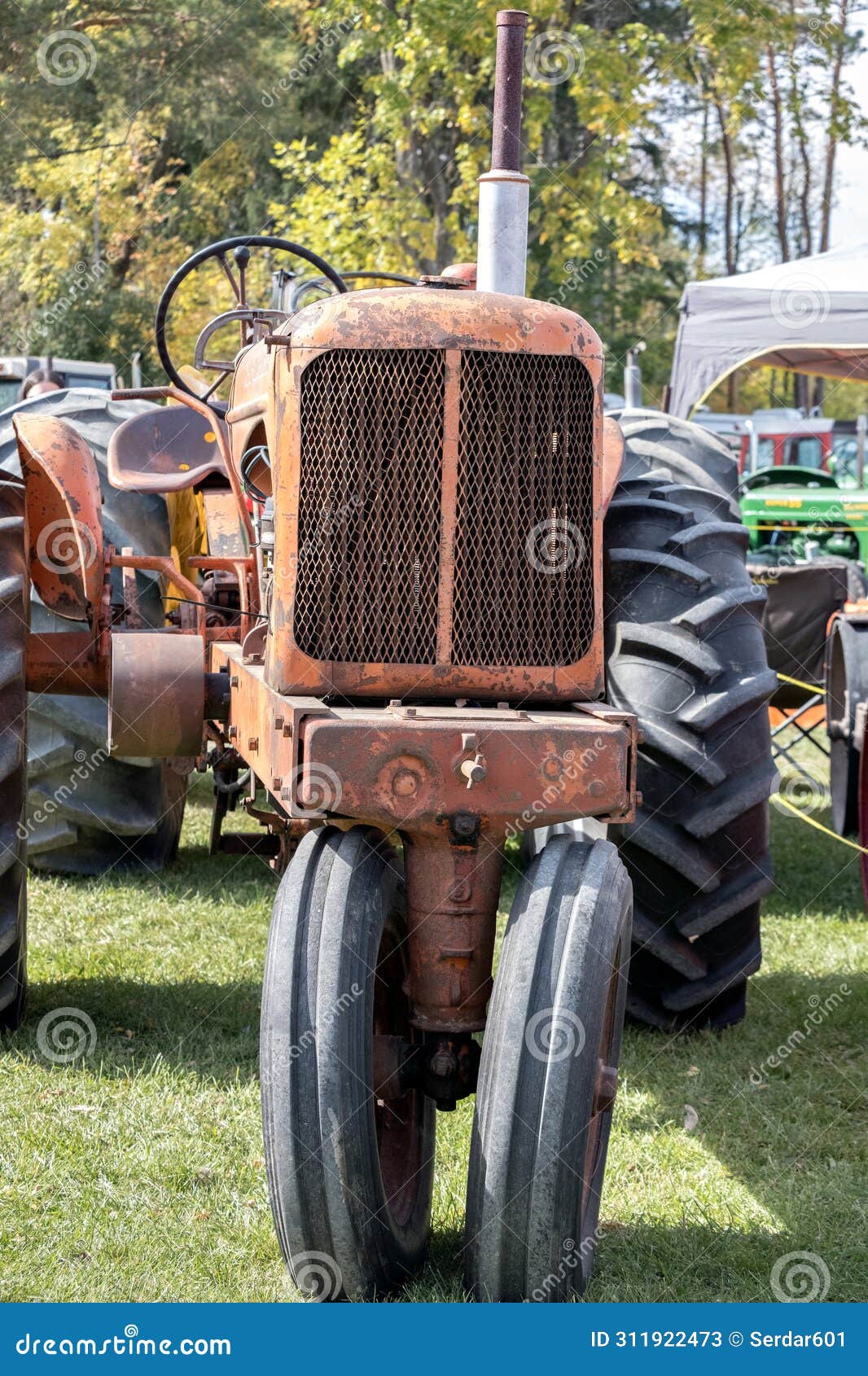 A tractor with grill stock image. Image of equipment - 311922473