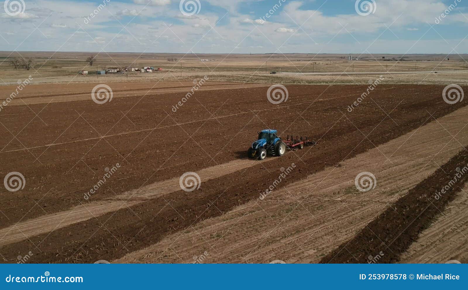 Tractor tilling field stock footage. Video of mechanical - 253978578
